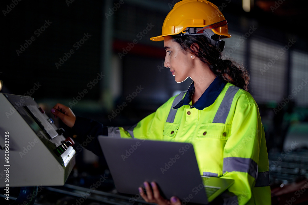 Factory engineer Brazilian woman standing confidence with laptop ...