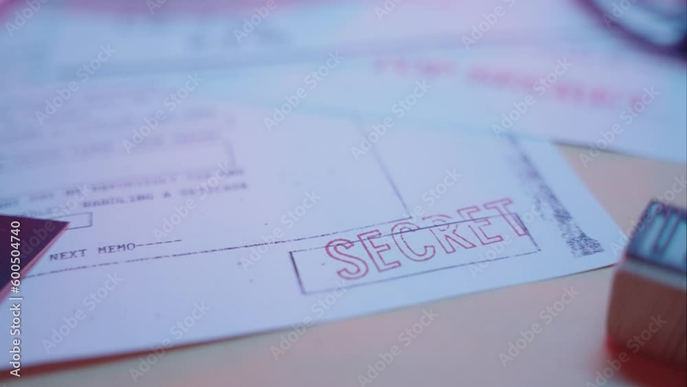 Secret stamp on official document using red ink giving high security ...