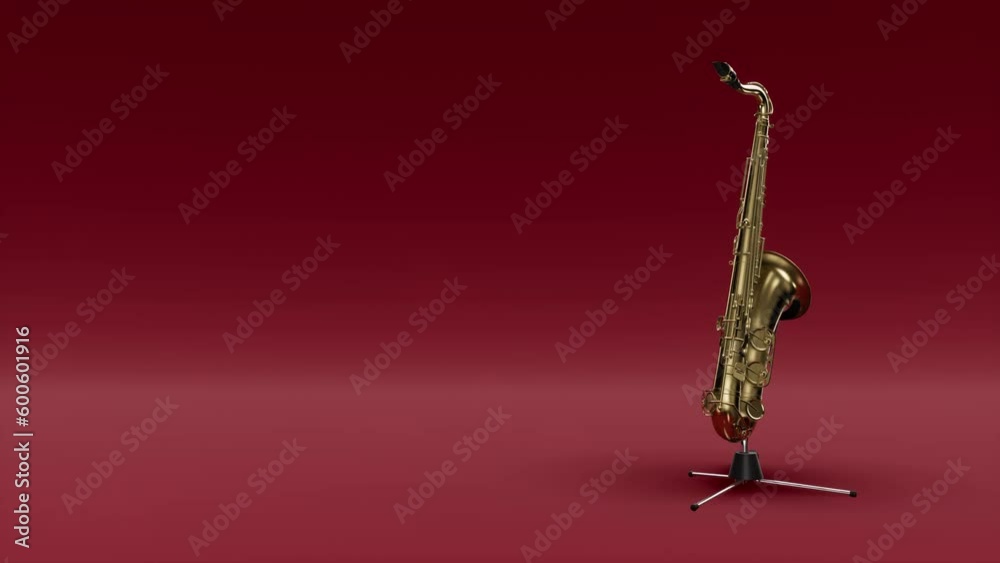 Saxophone isolated in loop in dark red degraded background aligned to ...