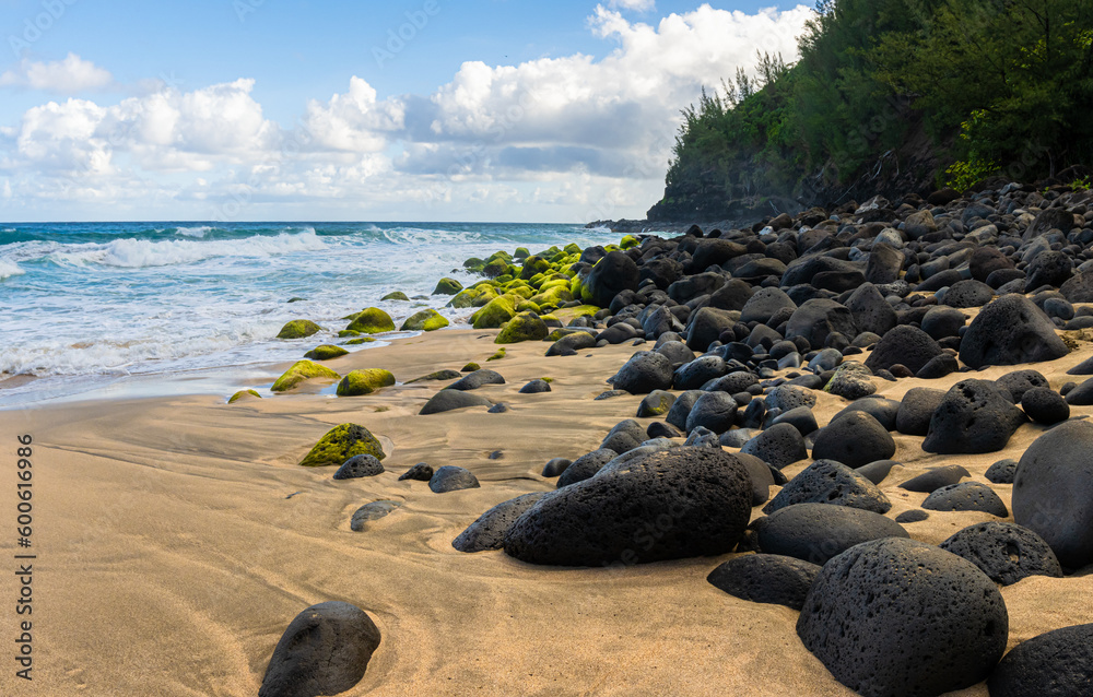 Lava Rocks and Golden Sand Against The Na Pali Cliffs at Hanakapiai ...