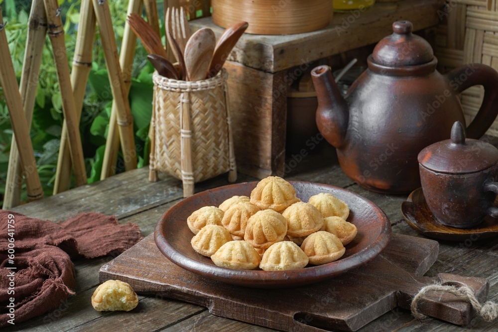 Kueh Bolu or Kuih Bahulu is a sponge cake. Asian traditional food is ...