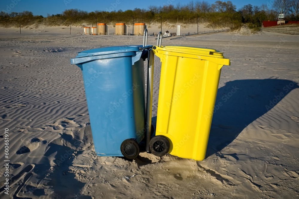 Garbage containers on the beach. Garbage sorting..Clean trash cans on ...