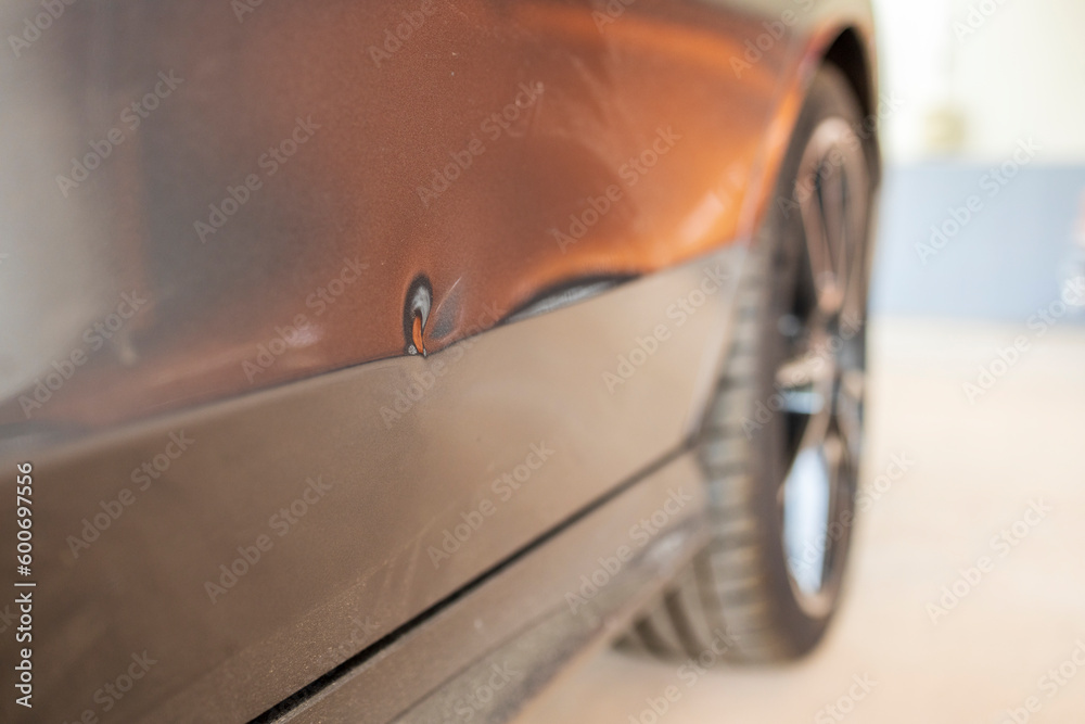 Car dent after traffic accident or crash.Deformity lesion on the rear ...