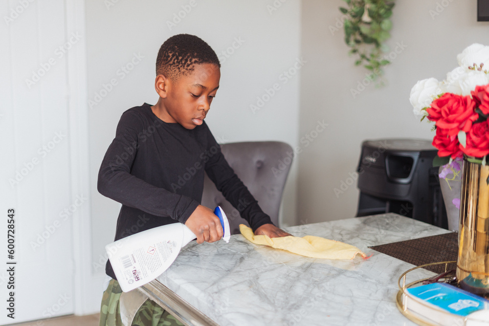 Boy Cleaning Table