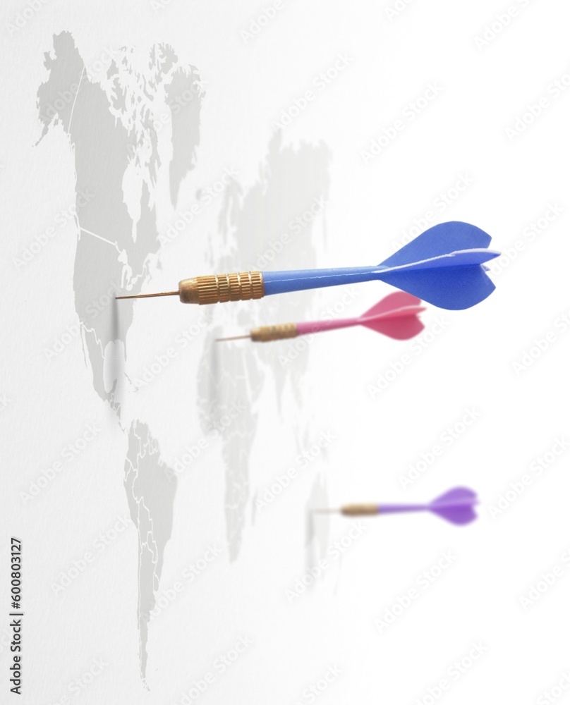 4 darts on a world map symbol of global business around the planet ...