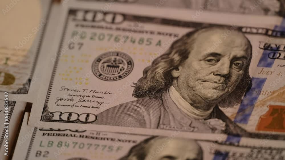 Us 100 dollar bills close up fast tracking top down, low angle, cash of ...