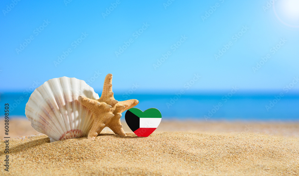 Beautiful beach in Kuwait. Flag of Kuwait in the shape of a heart and ...