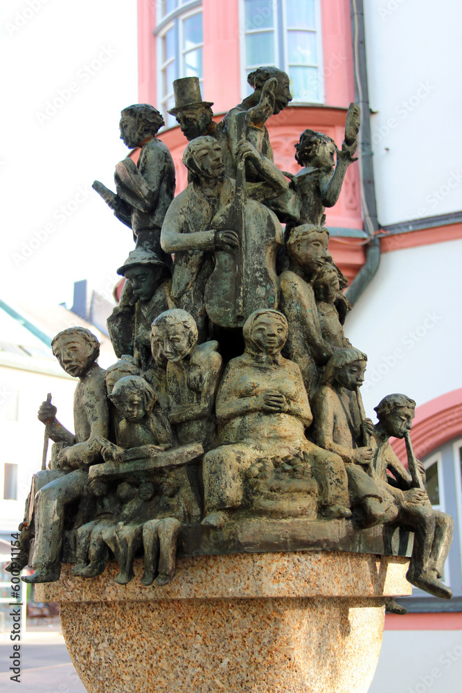 Hof, Germany - May 9, 2023: Sculpture in the fountain near the townhall ...