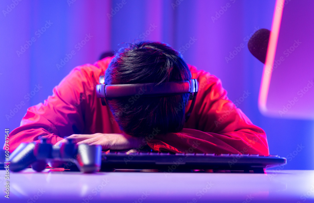 Angry asian gamer man playing computer pc. He lose in the game. Missed ...