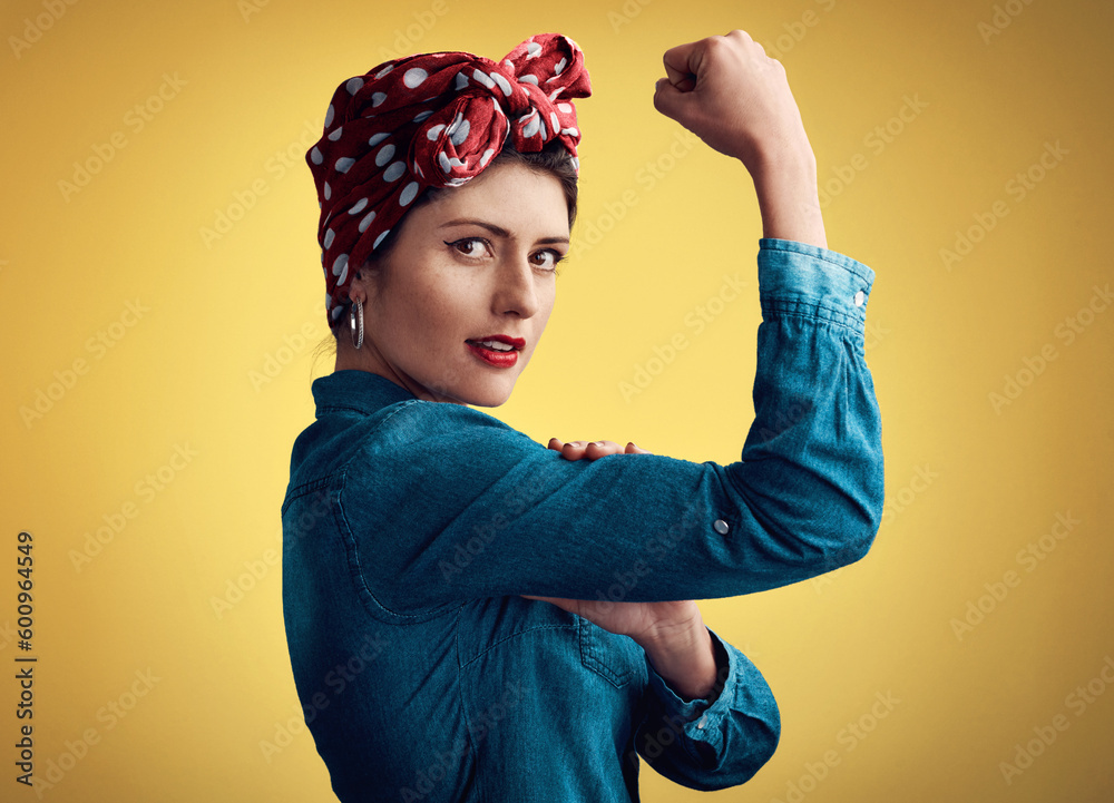 Woman, strong and flexing muscle portrait of a pinup girl in studio for ...