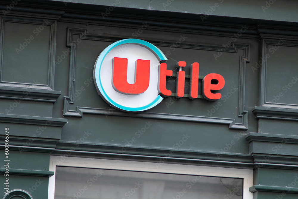 utile Super U supermarket wall entrance store french shop brand sign market logo text on facade ...
