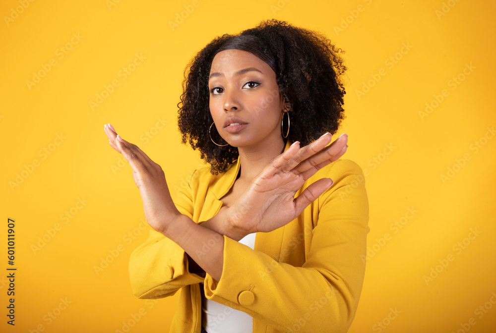 Rejection and warning concept. Displeased black lady crossing hands in ...