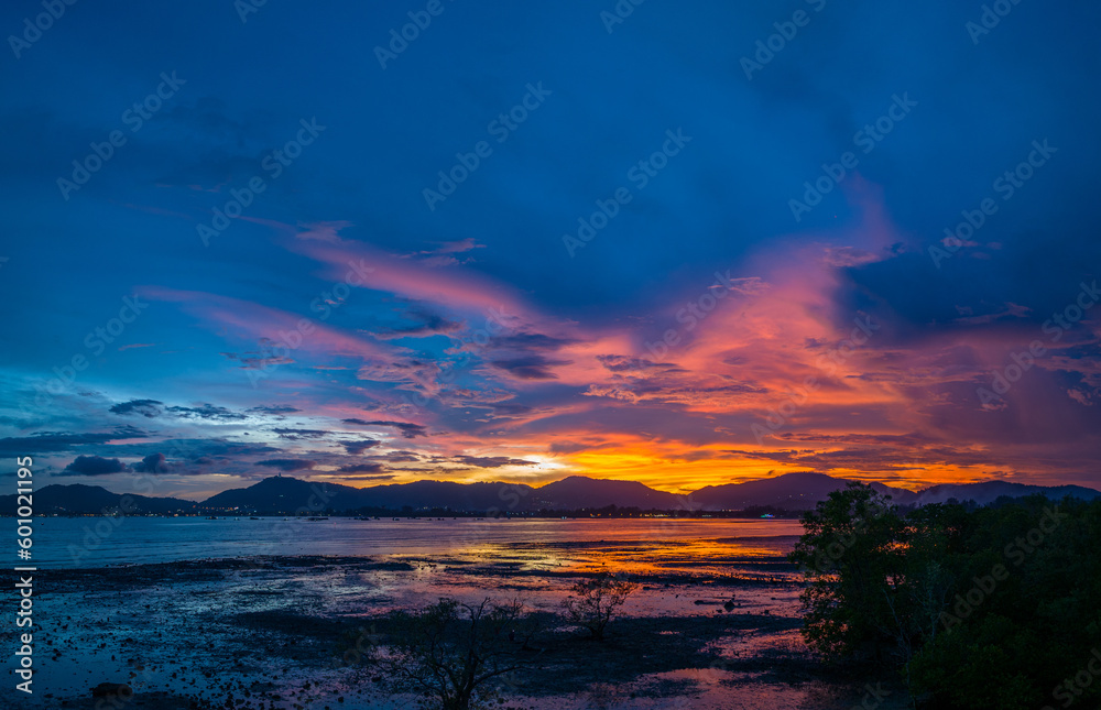 ..aerial view reflection of colorful cloud in bright sky of sunset ...