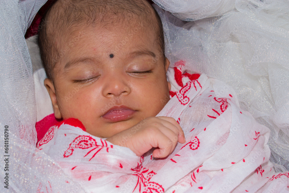 Adorable and cute little Indian Infant baby or new born with bindi or ...