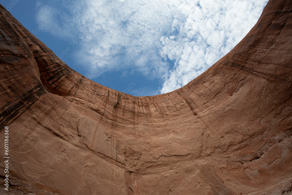 red rock texture with cracks, skies, water, background with space for ...