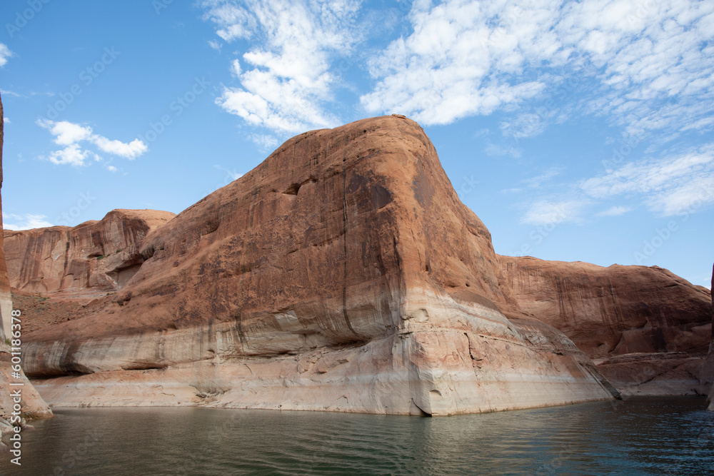 red rock texture with cracks, skies, water, background with space for ...