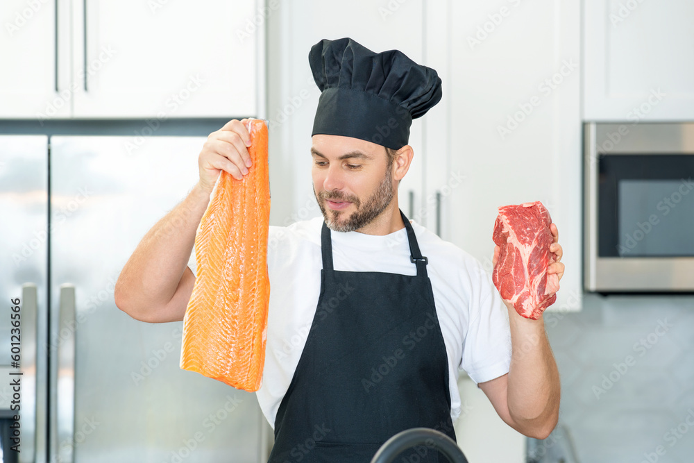 Fotografia do Stock: Chef in uniform cooking raw meat beef and fish ...