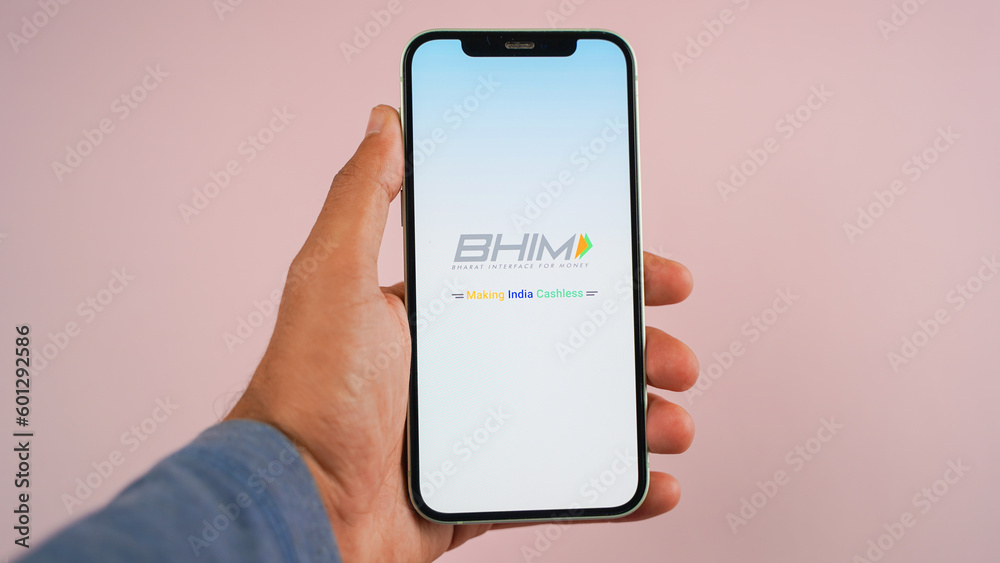 BHIM UPI mobile phone app on colour background: Kolkata, West Bengal ...