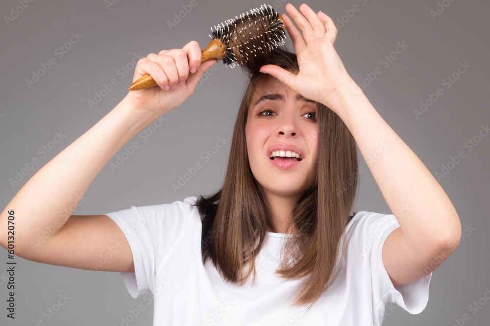 Hair loss woman with a comb and problem hair. Hairloss and hairs ...