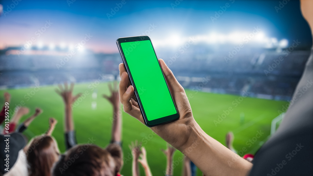 Sport Stadium Championship: Person's Hand Holding Green-Screen Chroma ...