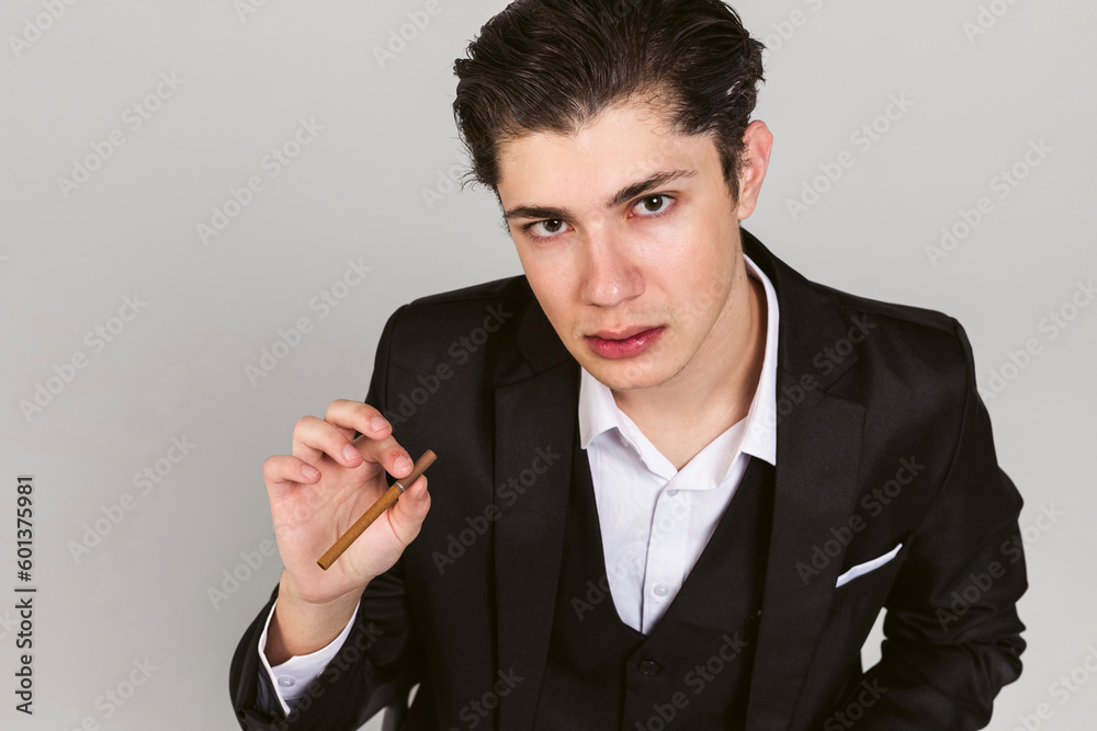 Portrait of a young mafia member with a slicked back hair, dressed in ...