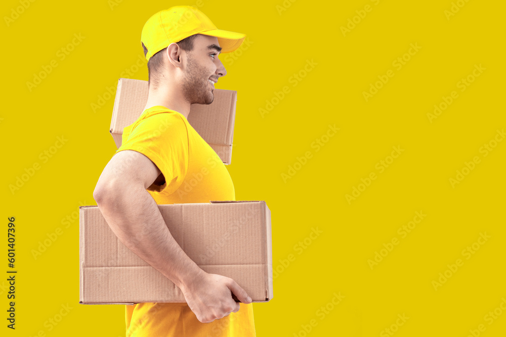 Delivery man with a box. Courier in uniform cap and t-shirt service ...