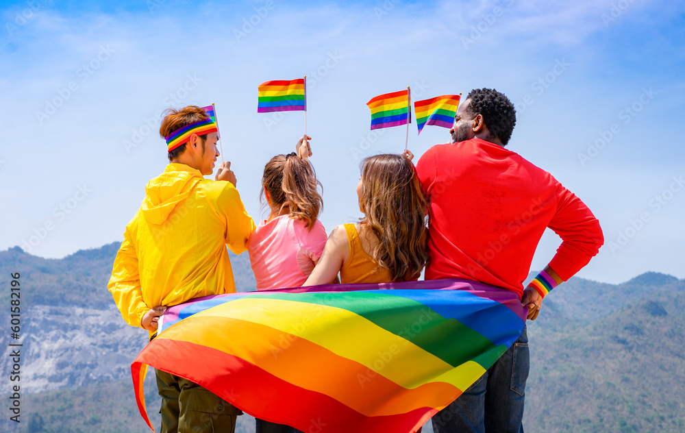 diverse lgbtq friends wearing colorful clothes,standing side by side ...