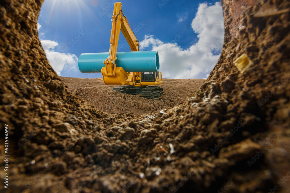 Crawler excavator are digging soil in the tunnel construction site ...