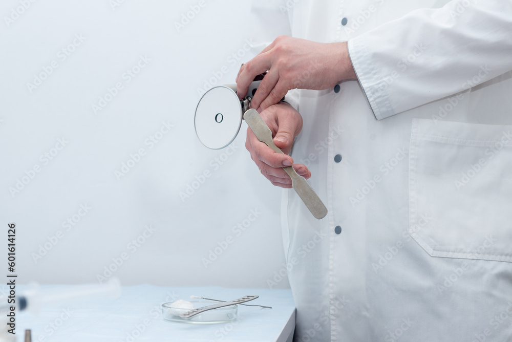 Medical equipment in the hands of a doctor, a doctor in a white coat, a ...