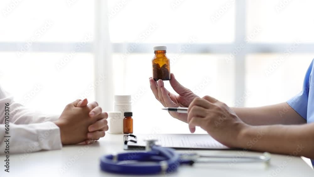 The doctor gives treatment advice to the patient in the hospital ...