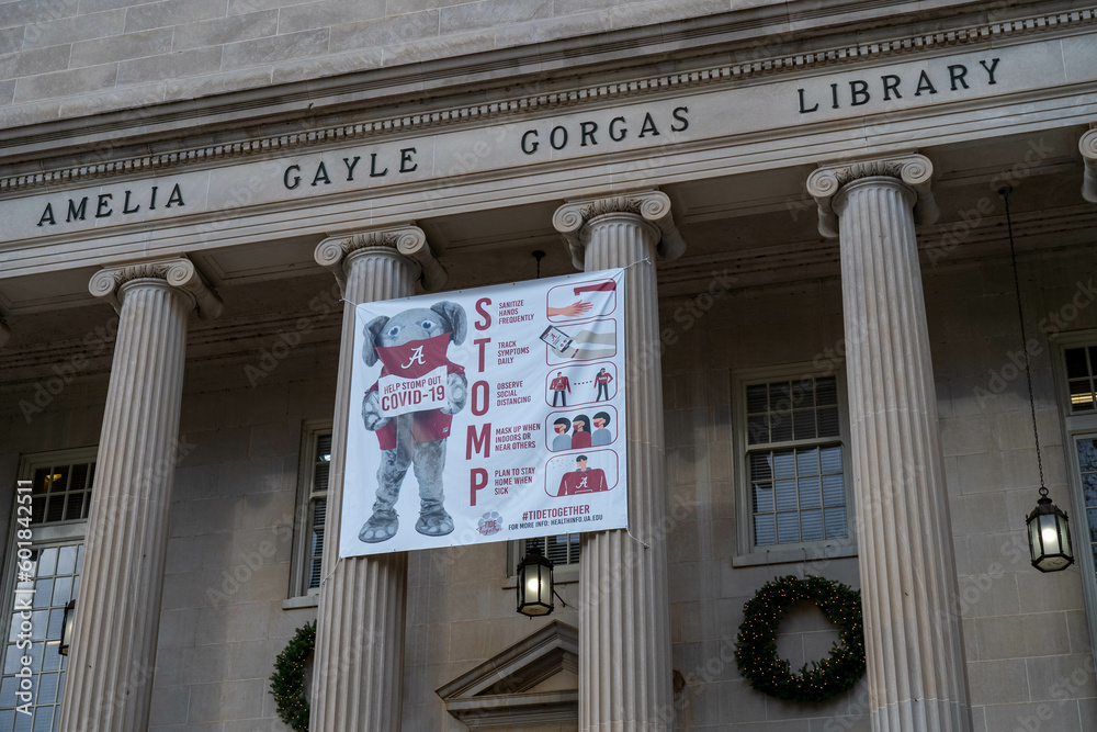 Stop covid sign on the exterior of Gorgas Library on the campus of The ...