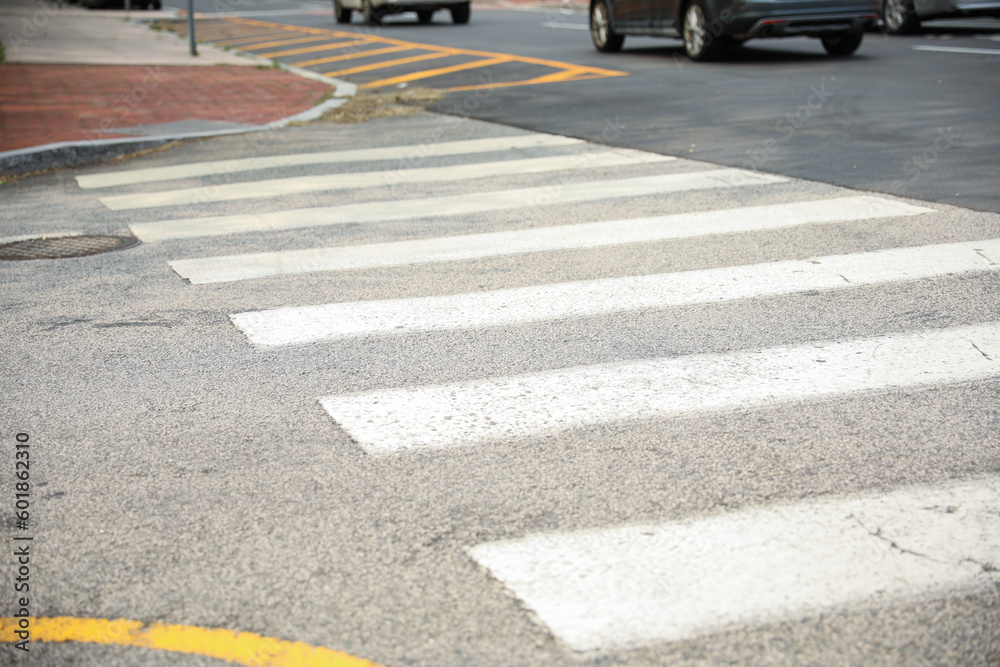 Crosswalk symbolizes pedestrian safety, accessibility, and shared ...