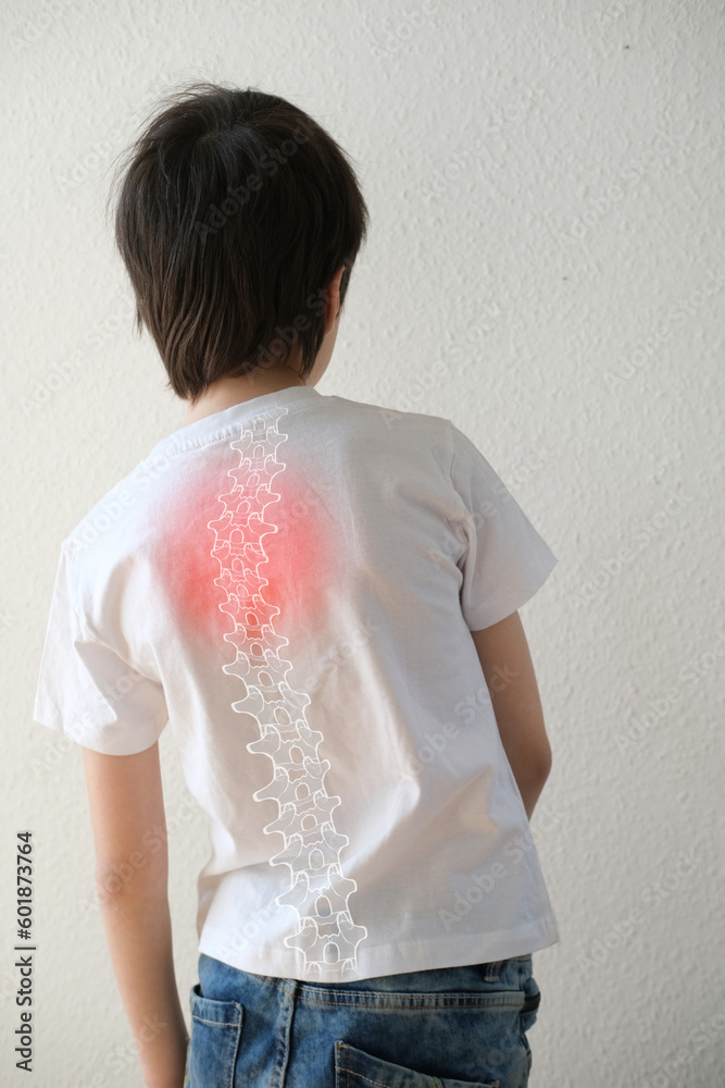 part of naked back of boy, child 10 years old in a white t-shirt ...