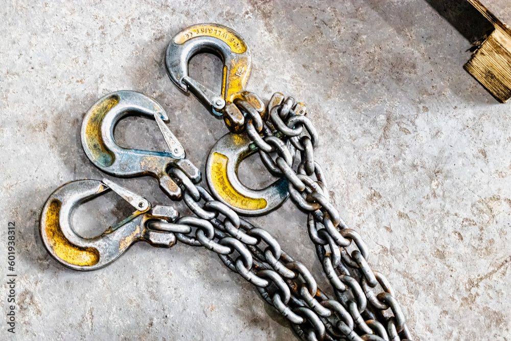 Metal industrial chains with hooks in the workshop of a metallurgical ...