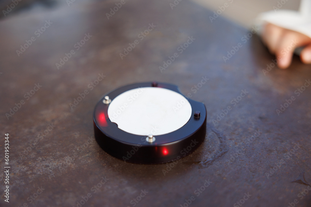 Queue Paging Wireless Calling System on rust steel table background ...