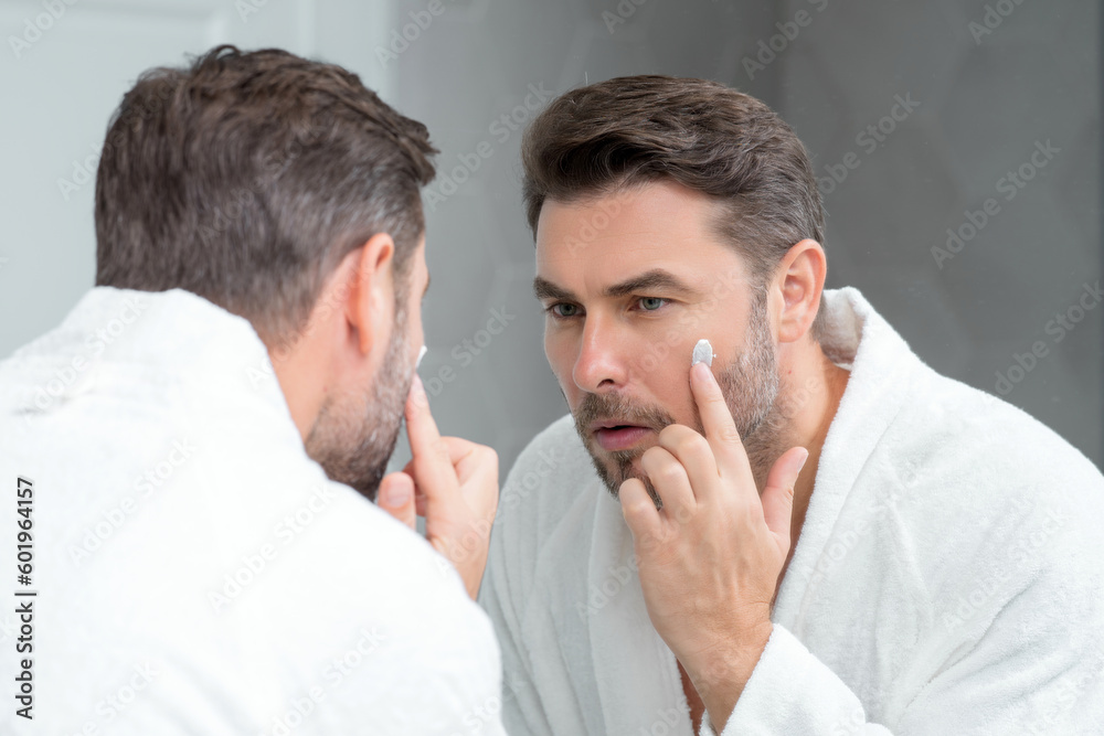 Man care of skin. Charming man with perfect soft skin. Male beauty and skincare concept. Man ...