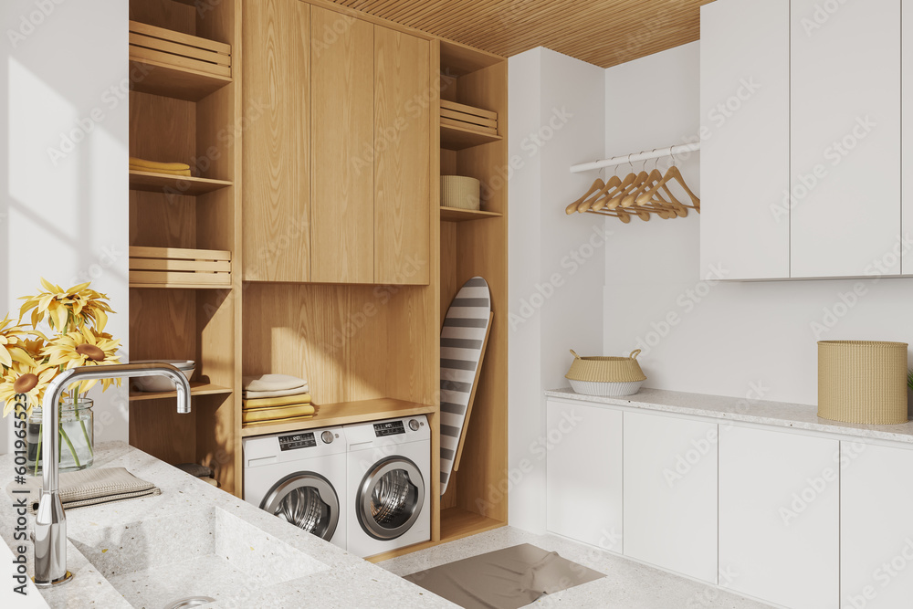 ภาพประกอบสต็อก Stylish light interior of laundry room with washing ...