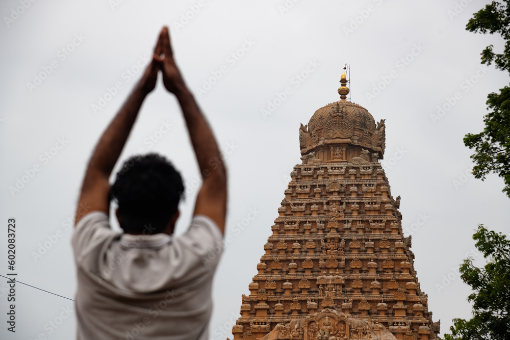 Indian men praying with his folded hands on Temple Background. Hindu ...
