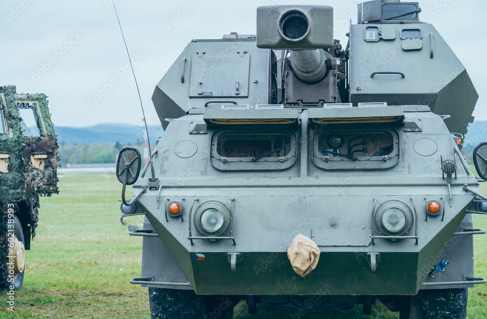Military vehicles. Combat howitzer. Modern military vehicle with cannon ...