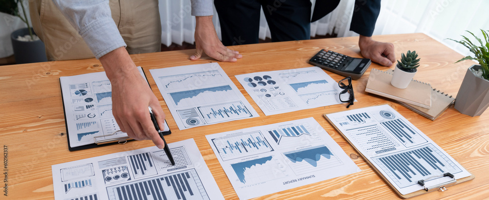 Analyst team in office analyzing financial data analysis for marketing ...