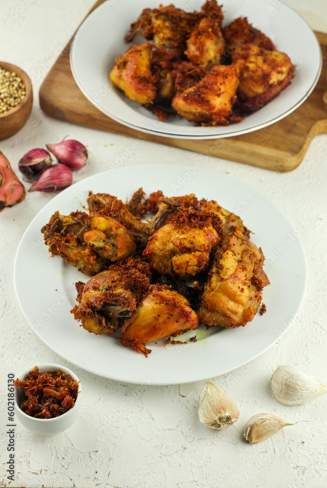 Indonesian fried chicken, ayam goreng bumbu kuning is a famous ...