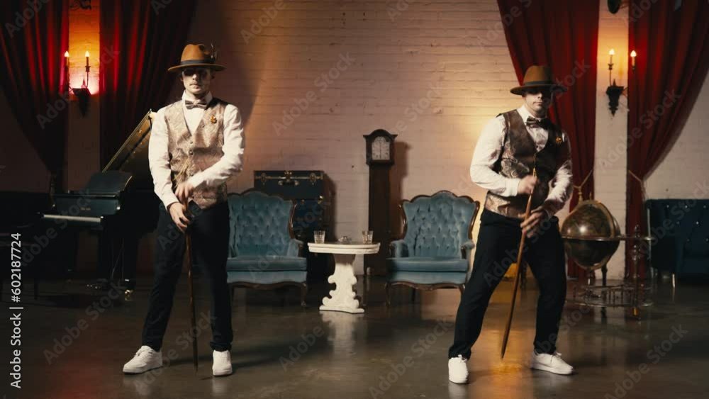 Stockvideon Cinematic RED camera shot of two stylish professional male ...