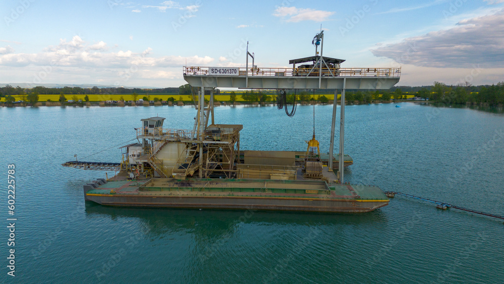 Industrial boat floating on the lake. Boat in the middle of the lake ...