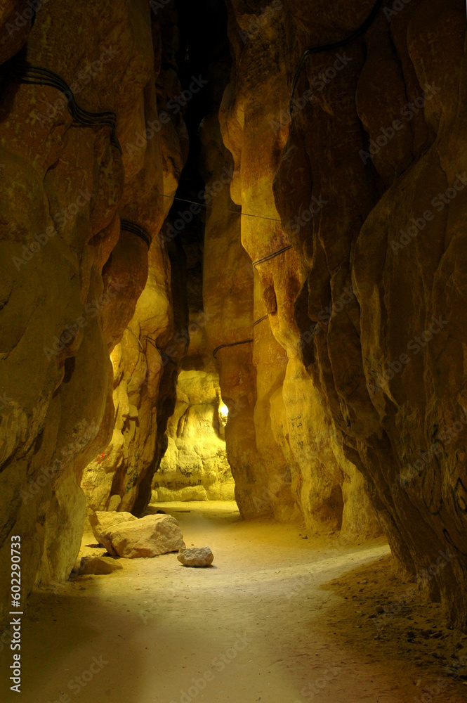 Mountain cave and sunlight falling from the top aesthetically in the ...