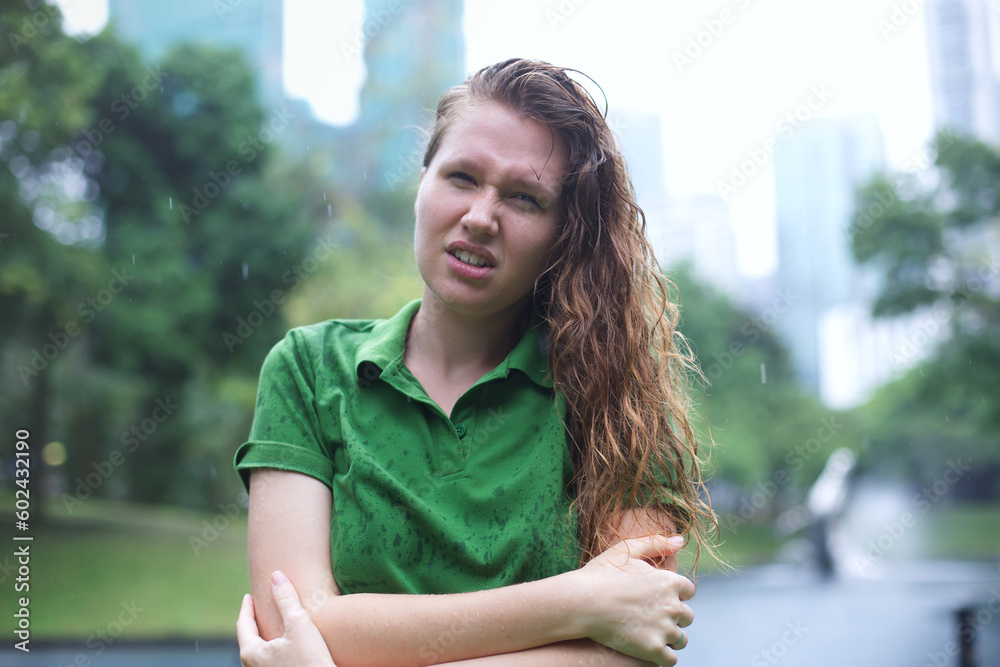 Sad woman under summer rain.emotional girl wet in the rain without ...
