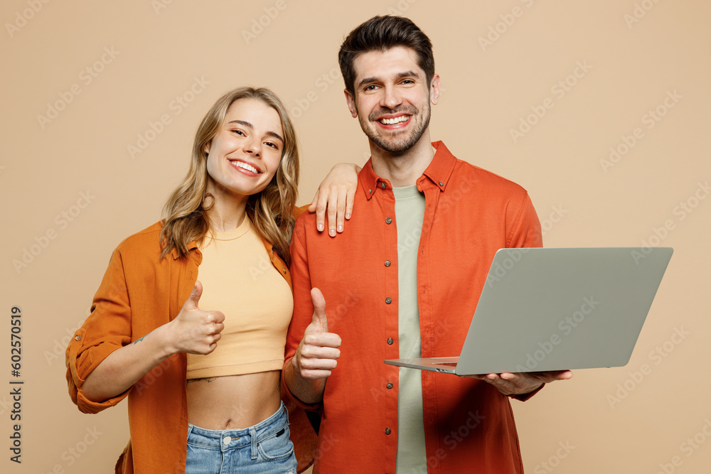 Young fun couple two friends family IT man woman wear casual clothes ...