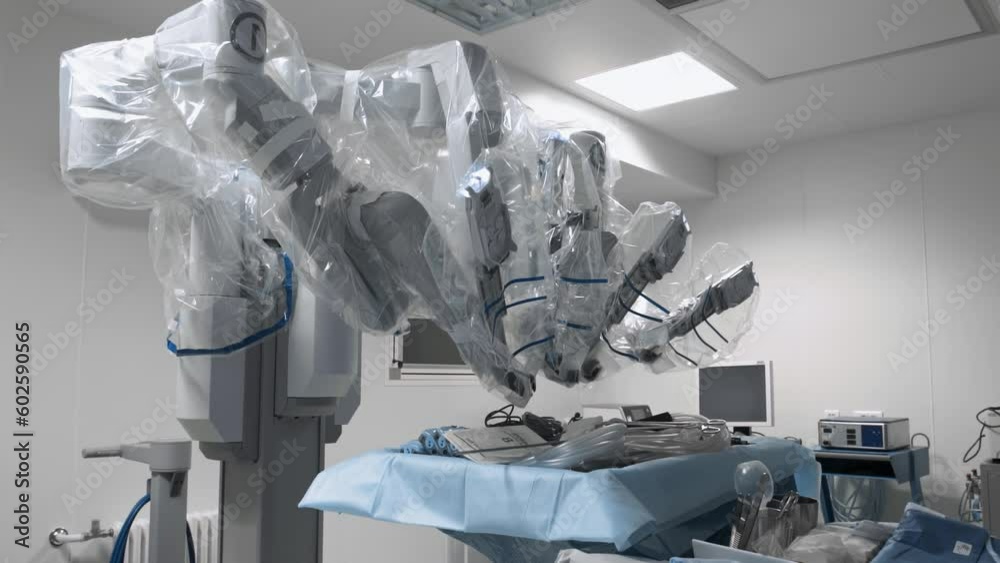 Operating room in modern clinic equipped with advanced robotic tools ...
