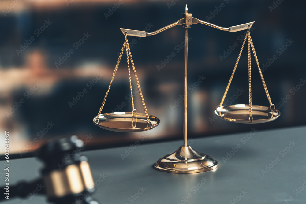 Shiny golden balanced scale and wooden gavel in law firm or lawyer ...