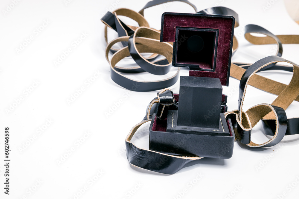 Tefillin or phylacteries . Pair of black leather boxes for the arm and ...