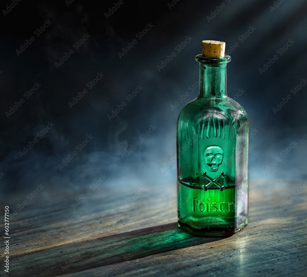 Glass poison bottle with skull and bones. Danger sign, symbol of death ...